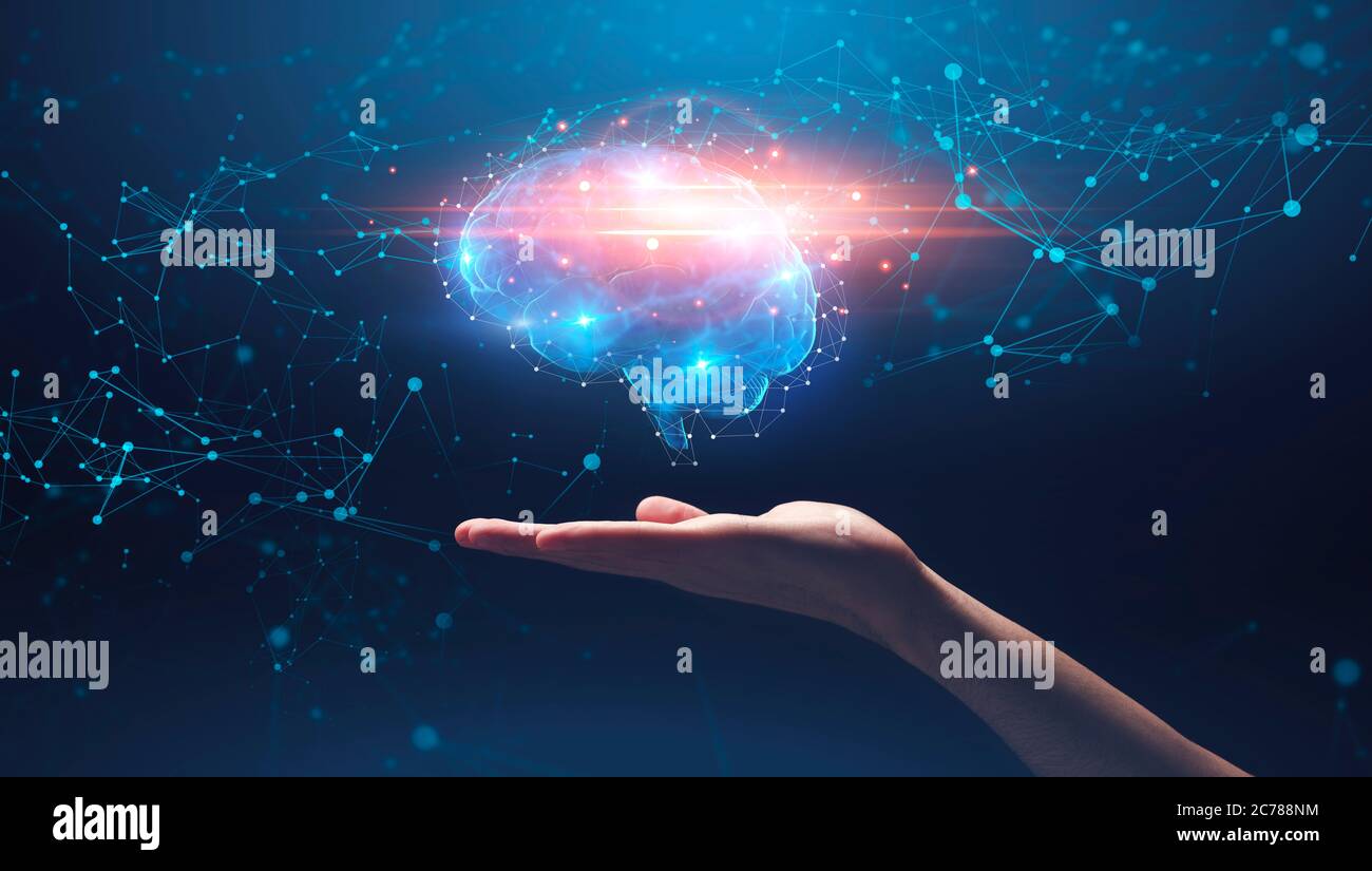 Hand holding shining brain over galaxy background Stock Photo - Alamy