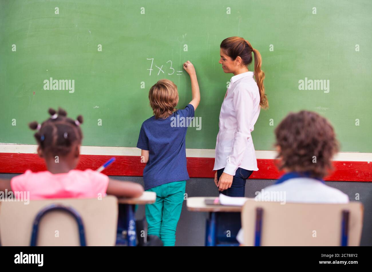School teacher interviewing pupil hi-res stock photography and images ...