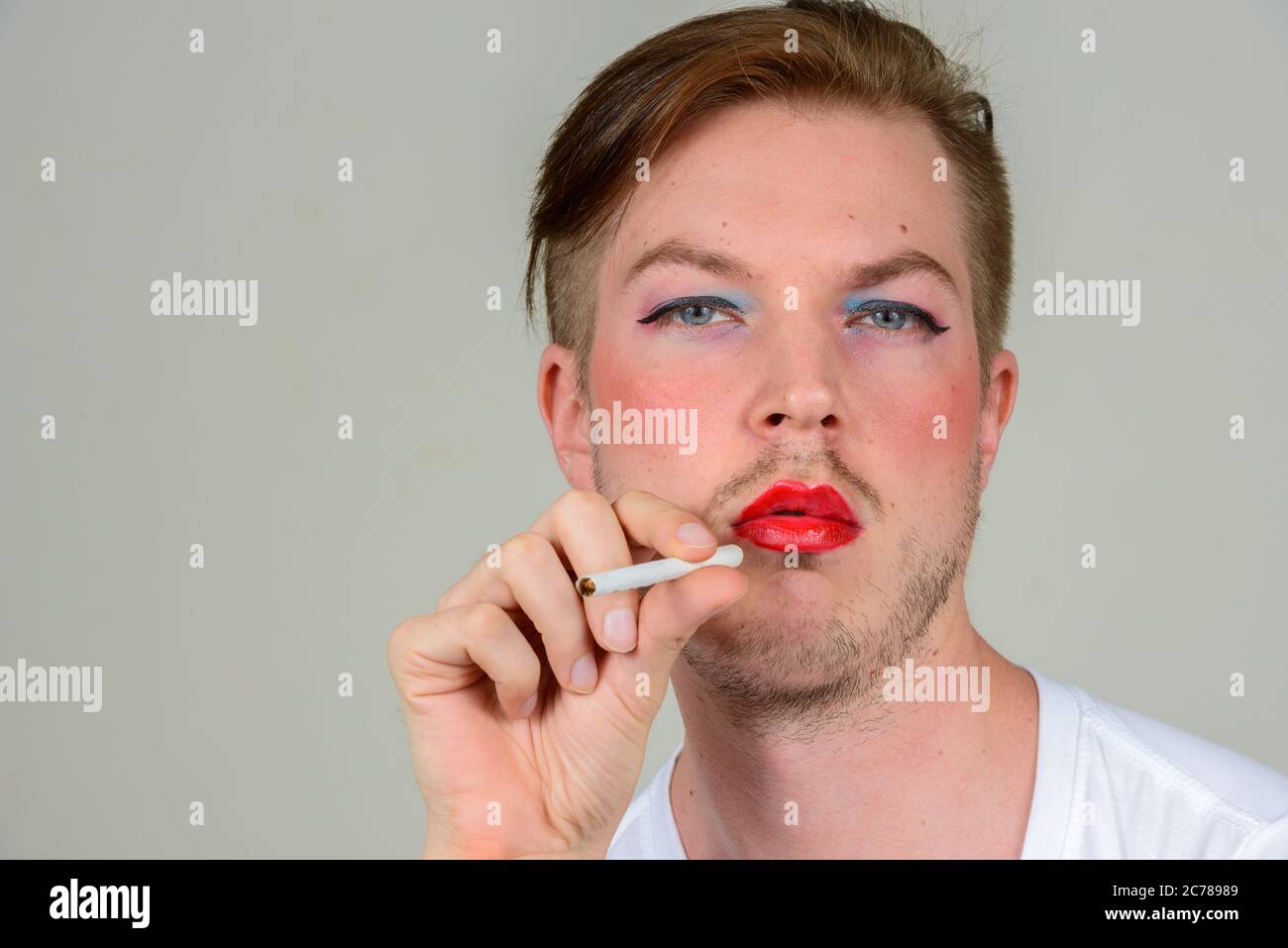 Man stubble lipstick hi-res stock photography and images - Alamy