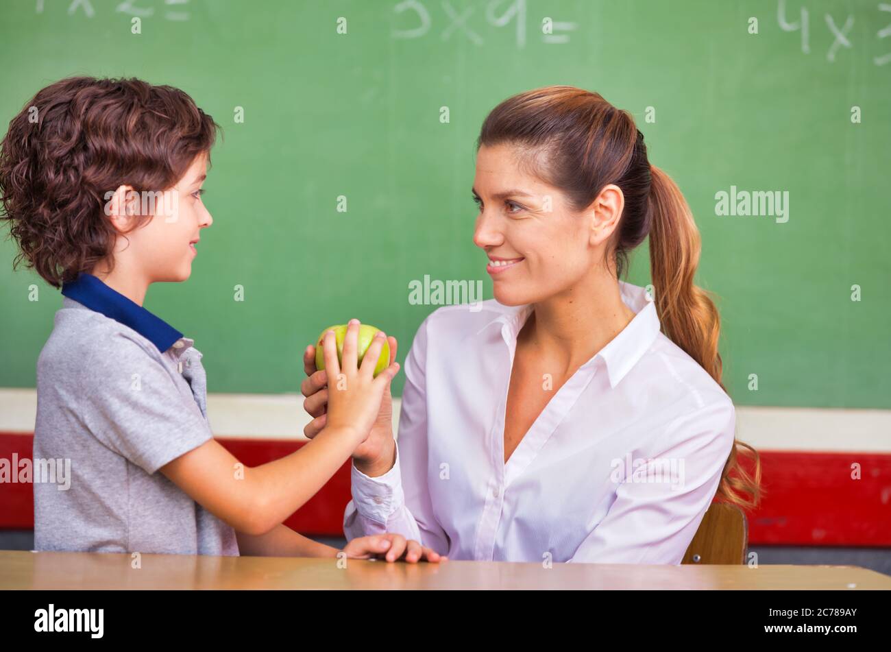 Two boys talking classroom hi-res stock photography and images - Alamy