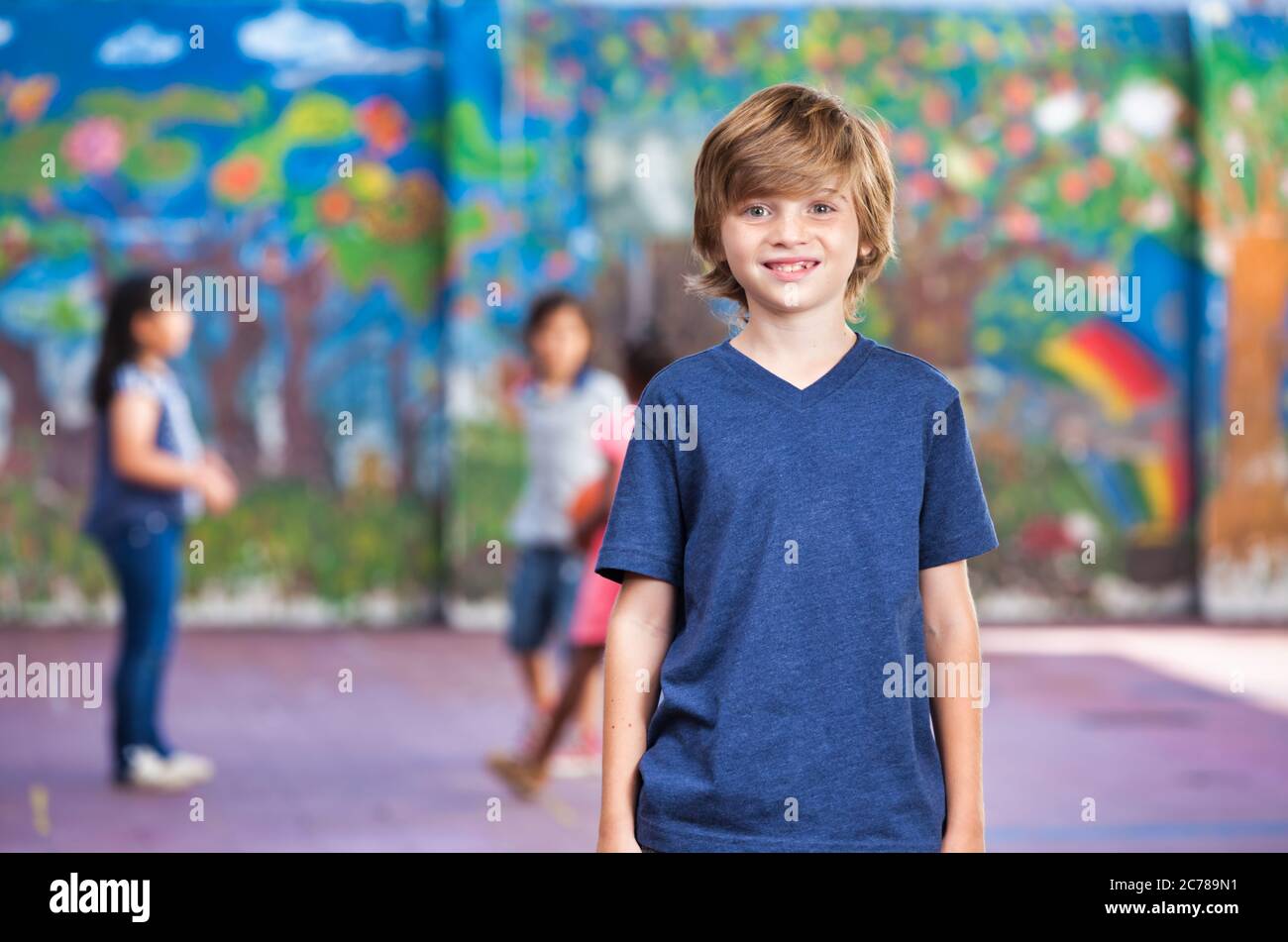 Elementary school scene. Playing children in the schoolyard Stock Photo ...