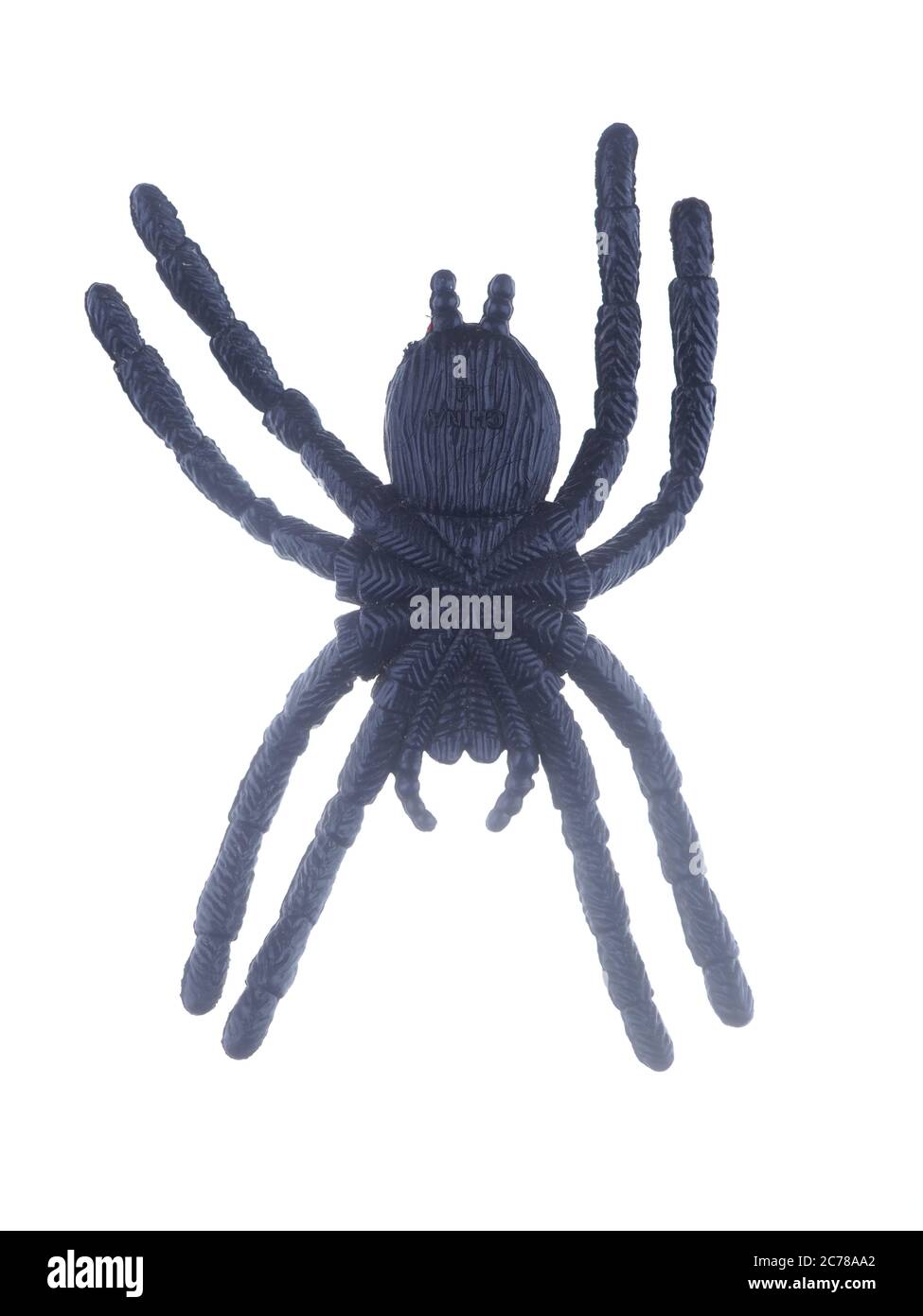 toy spider on a white background Stock Photo - Alamy