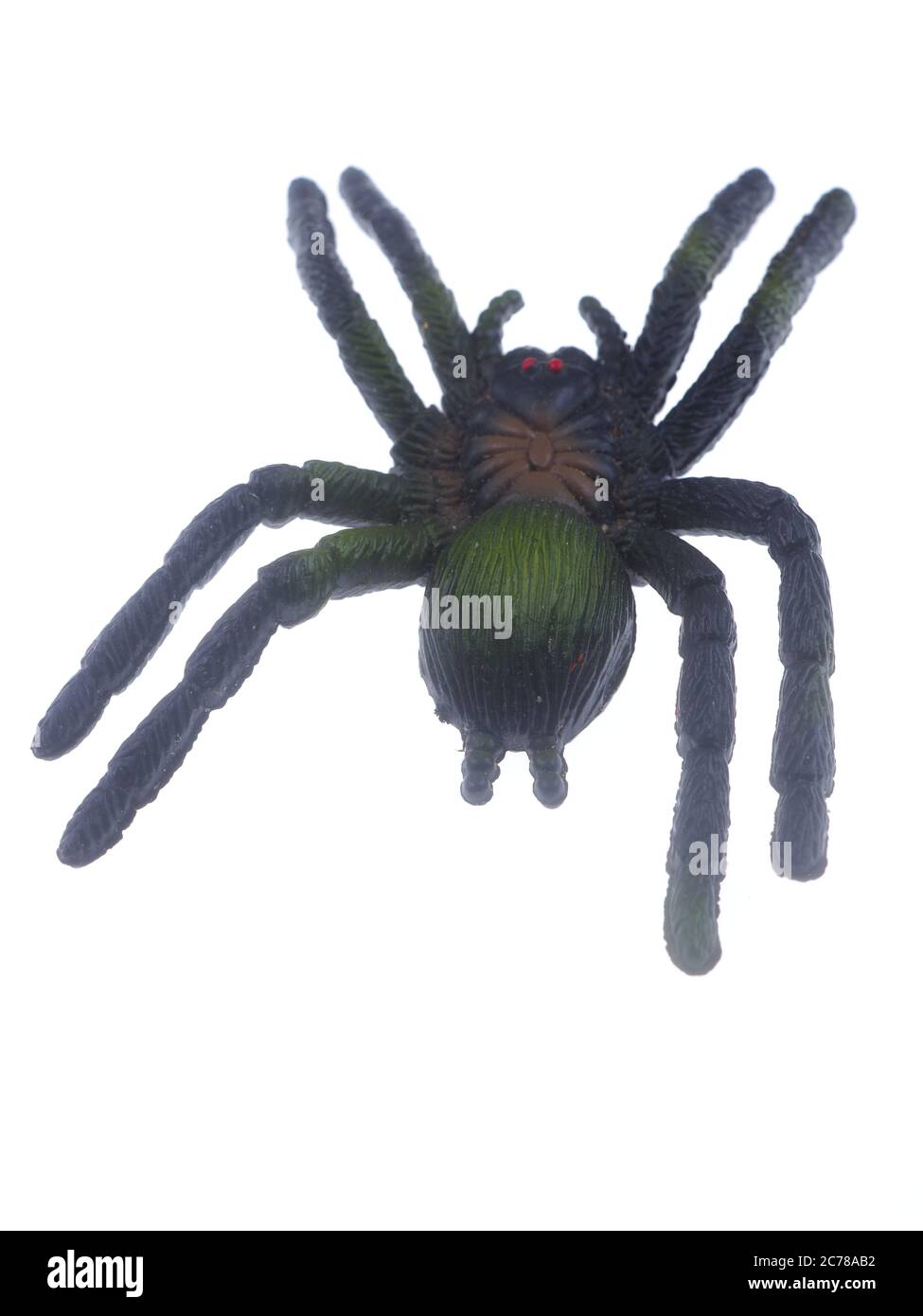 toy spider on a white background Stock Photo - Alamy