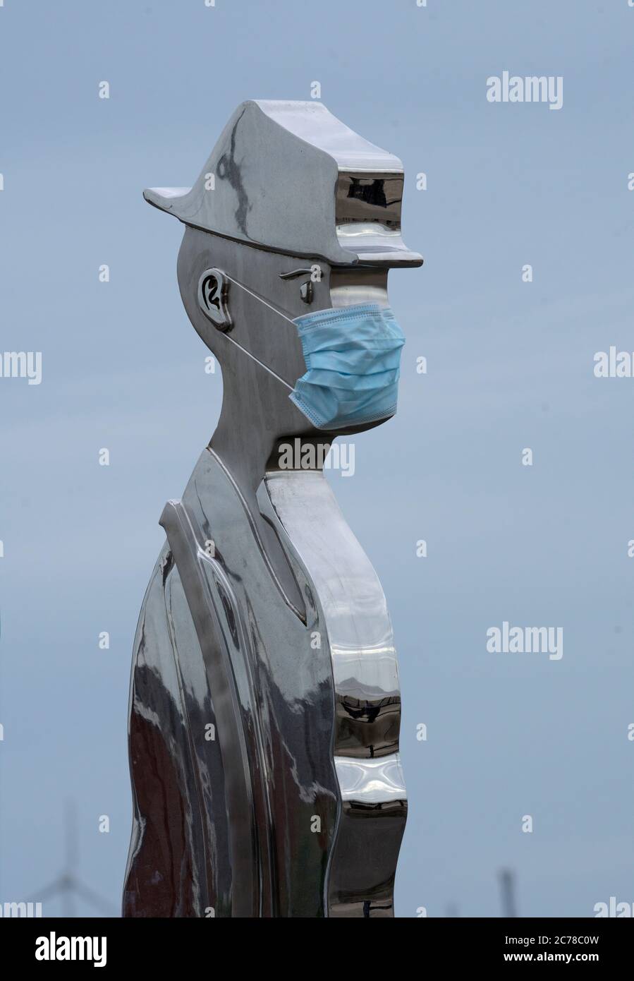 Lowry statue with face mask in Knott End on sea, Lancashire, UK Stock ...