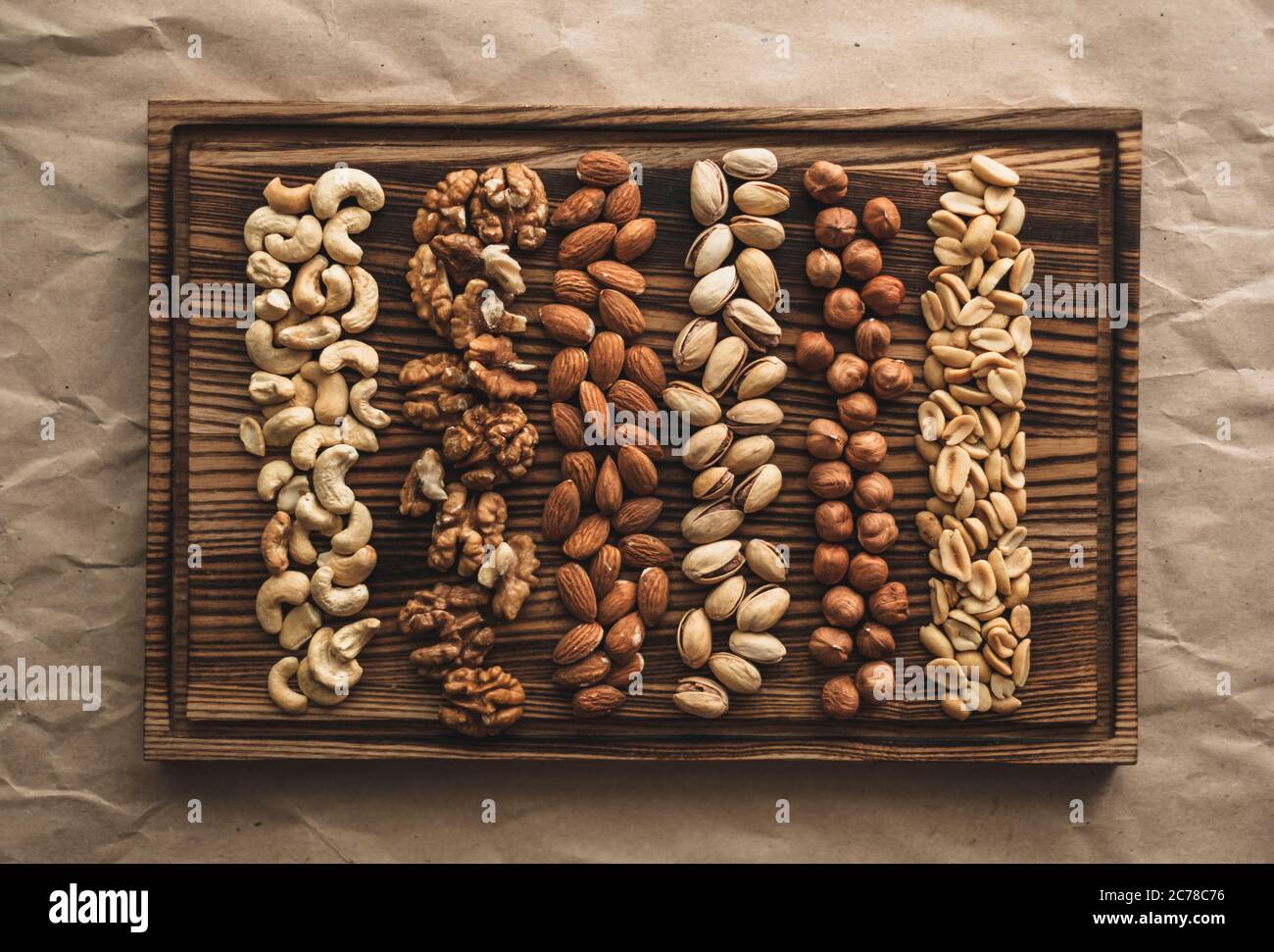 Different types of nuts, nut mix of almonds, hazelnuts, cashews ...