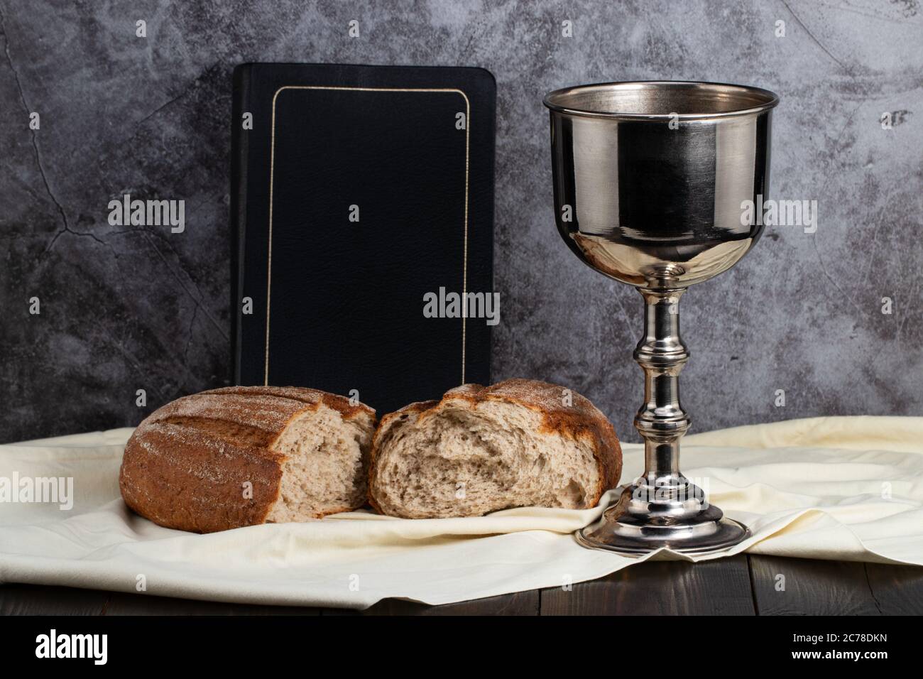 holy communion chalice with wine and bread Stock Photo - Alamy