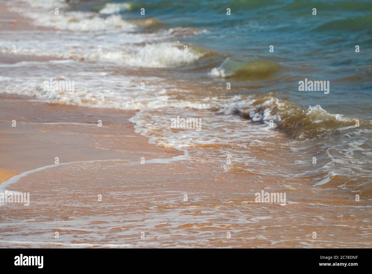 foaming sea wave on a sandy beach. Summer sea background Stock Photo ...