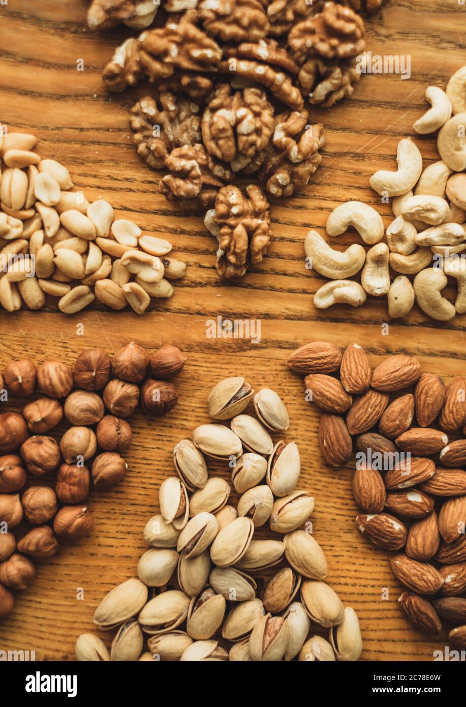 Different types of nuts, nut mix of almonds, hazelnuts, cashews ...