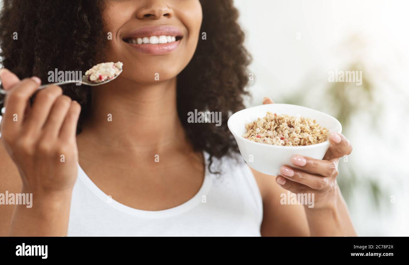 Healthy Breakfast. Close Up Of Happy African Woman Eating Oatmeal With ...