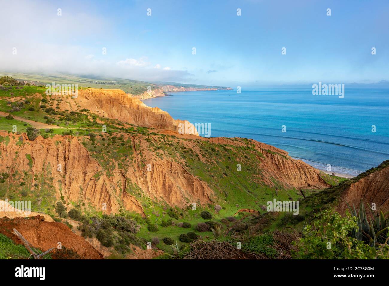 the beautiful blue waters and yellow cliff faces on the fleurieu ...
