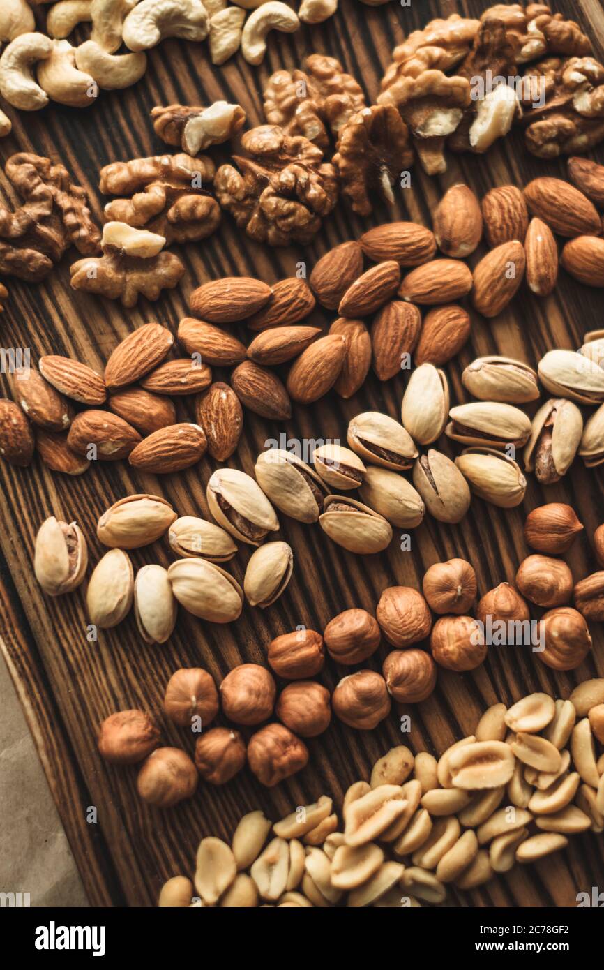 Different types of nuts, nut mix of almonds, hazelnuts, cashews ...