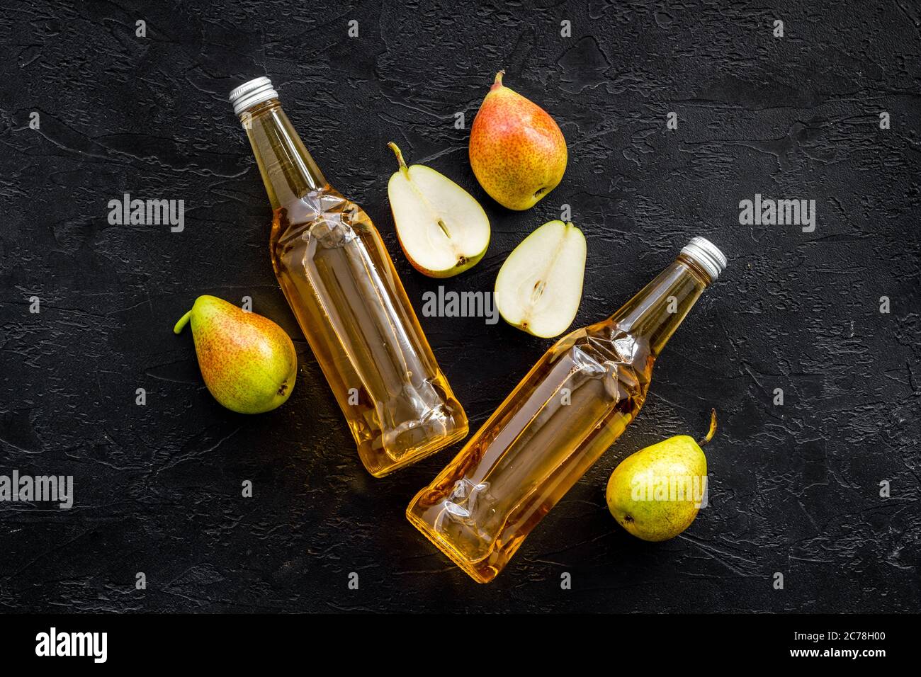 Bottles of beer with peer from above Stock Photo - Alamy