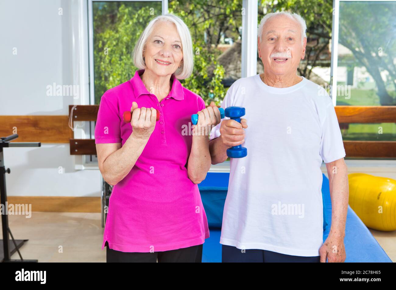 Elderly people at the gym making physical exercises Stock Photo - Alamy