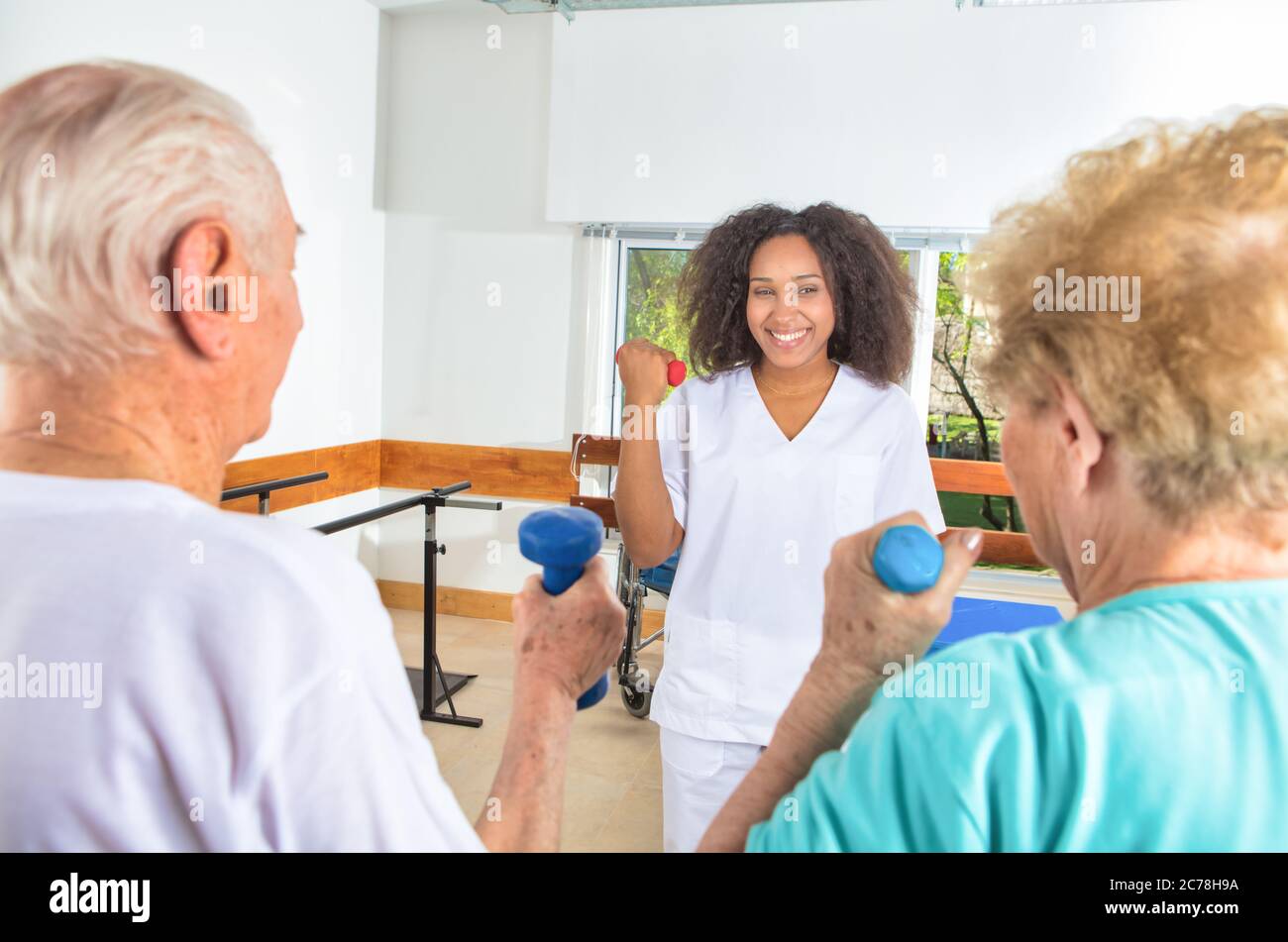 Elderly people at the gym making physical exercises Stock Photo - Alamy