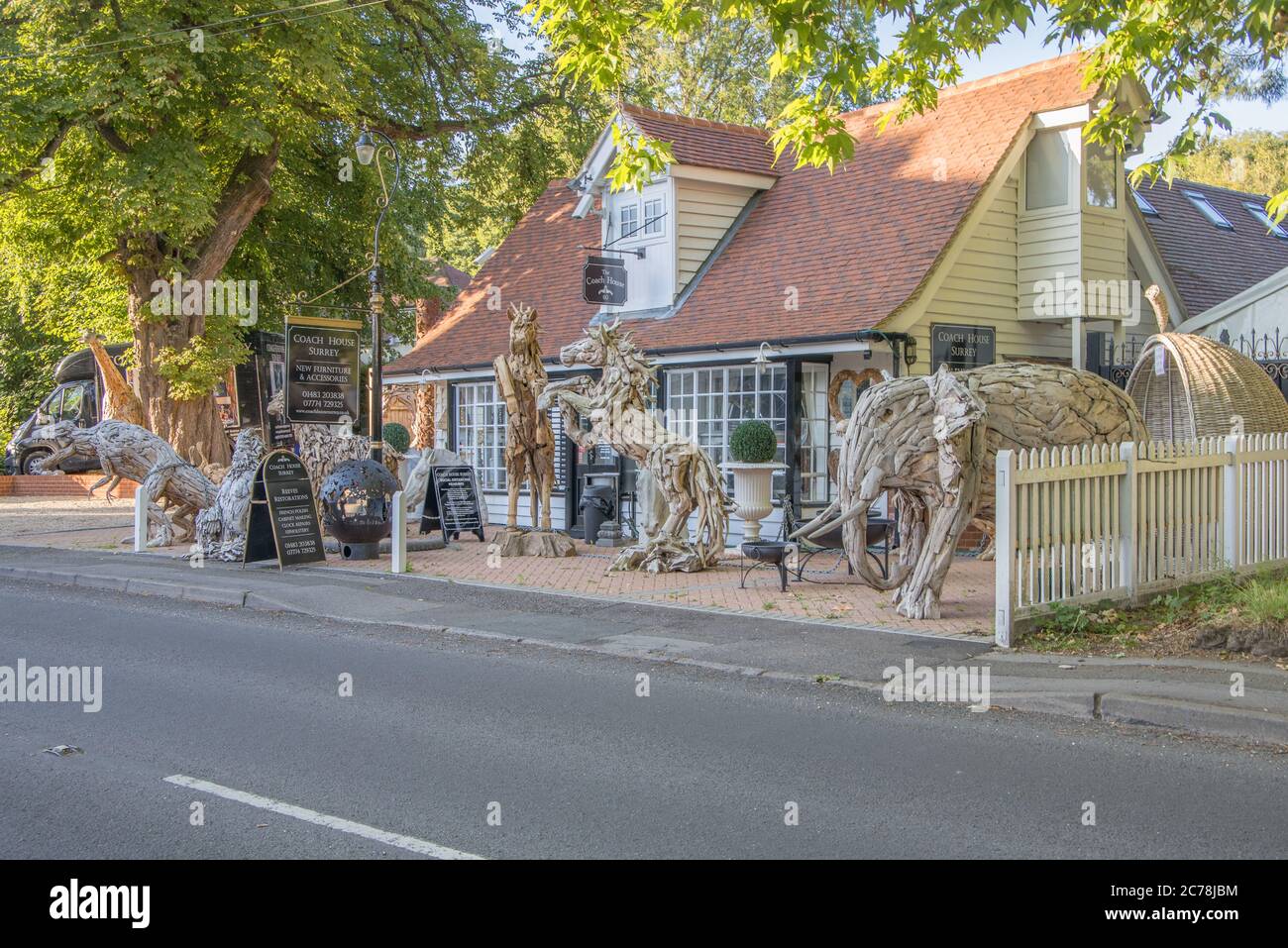 unique wooden sculptures at the coach house in the village of gomshall ...