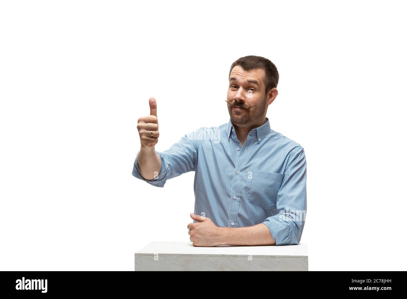 Thumb up. Young caucasian man with funny, unusual popular emotions and ...