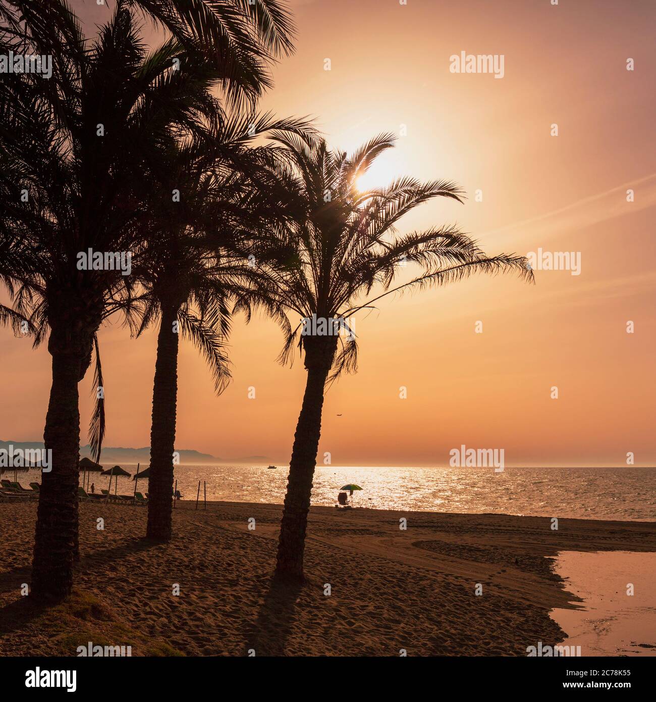 Early morning on Playamar beach, Torremolinos, Costa del Sol, Malaga ...
