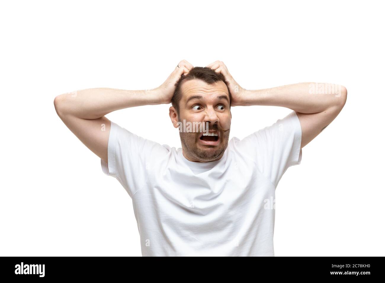 Scared. Young caucasian man with funny, unusual popular emotions and ...