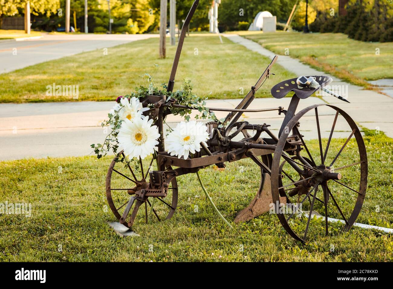 rusty farm tool that has been re-purposed Stock Photo - Alamy