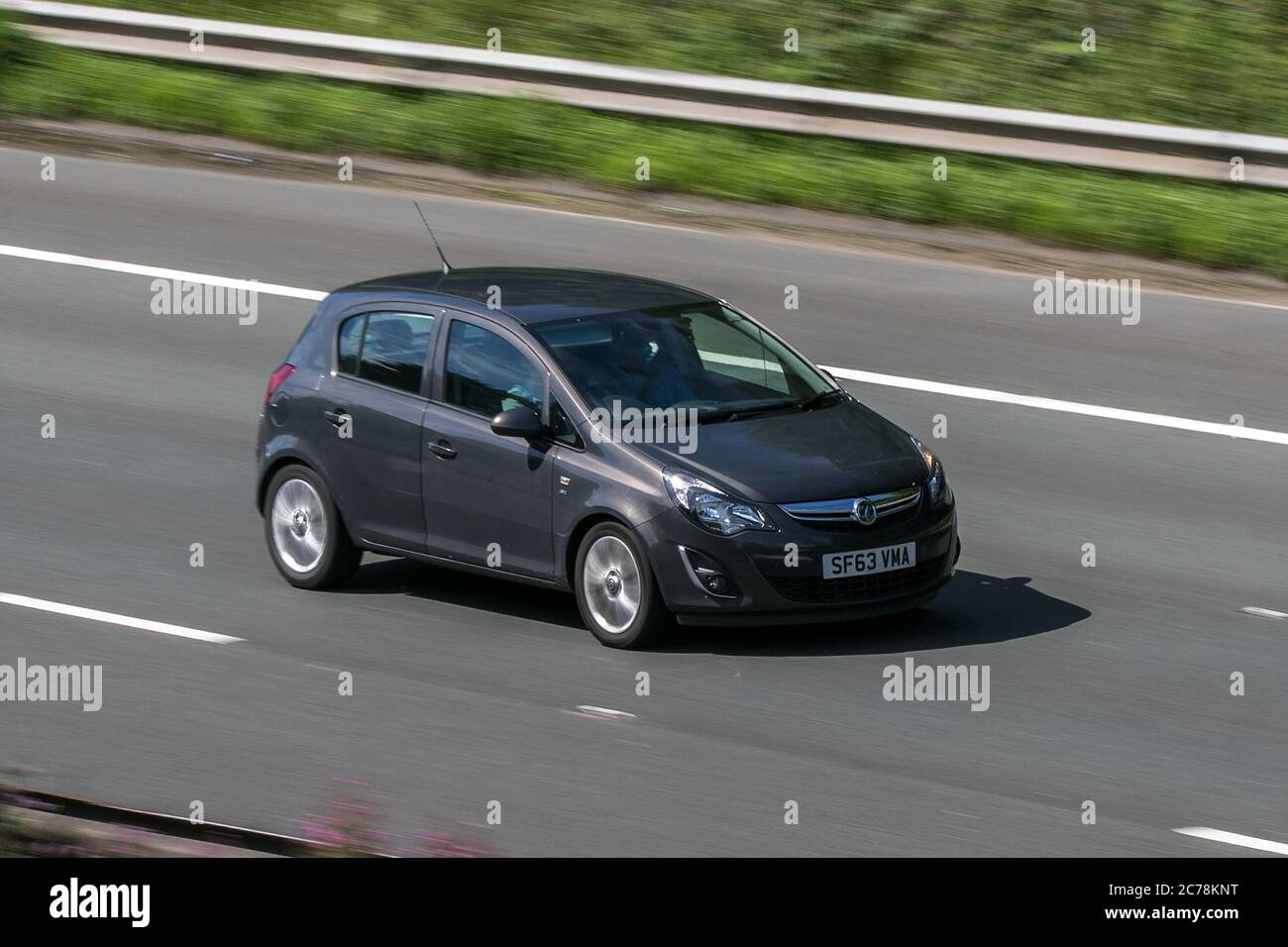 A 2013 Vauxhall Corsa Se Grey Car Hatchback Petrol driving on the M6 ...