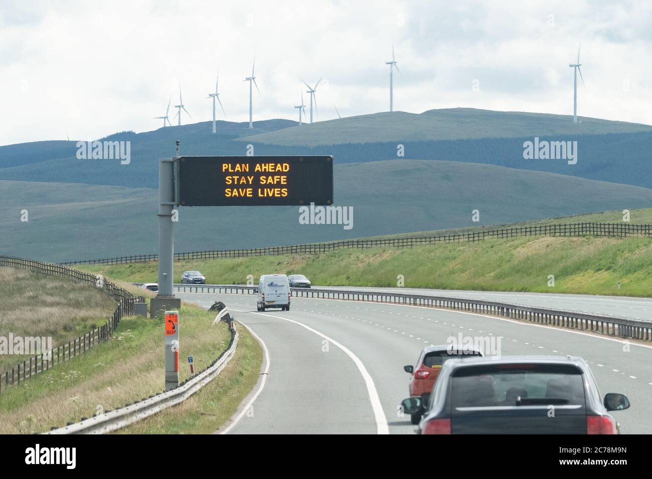 Plan Ahead Stay Safe Save Lives sign over M74 motorway Scotland during ...