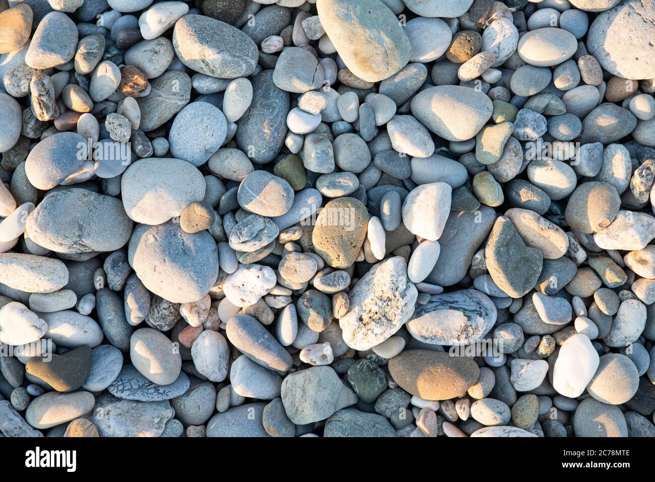 White and Gray Color Pebbles on a Beach for a Background Stock Photo ...