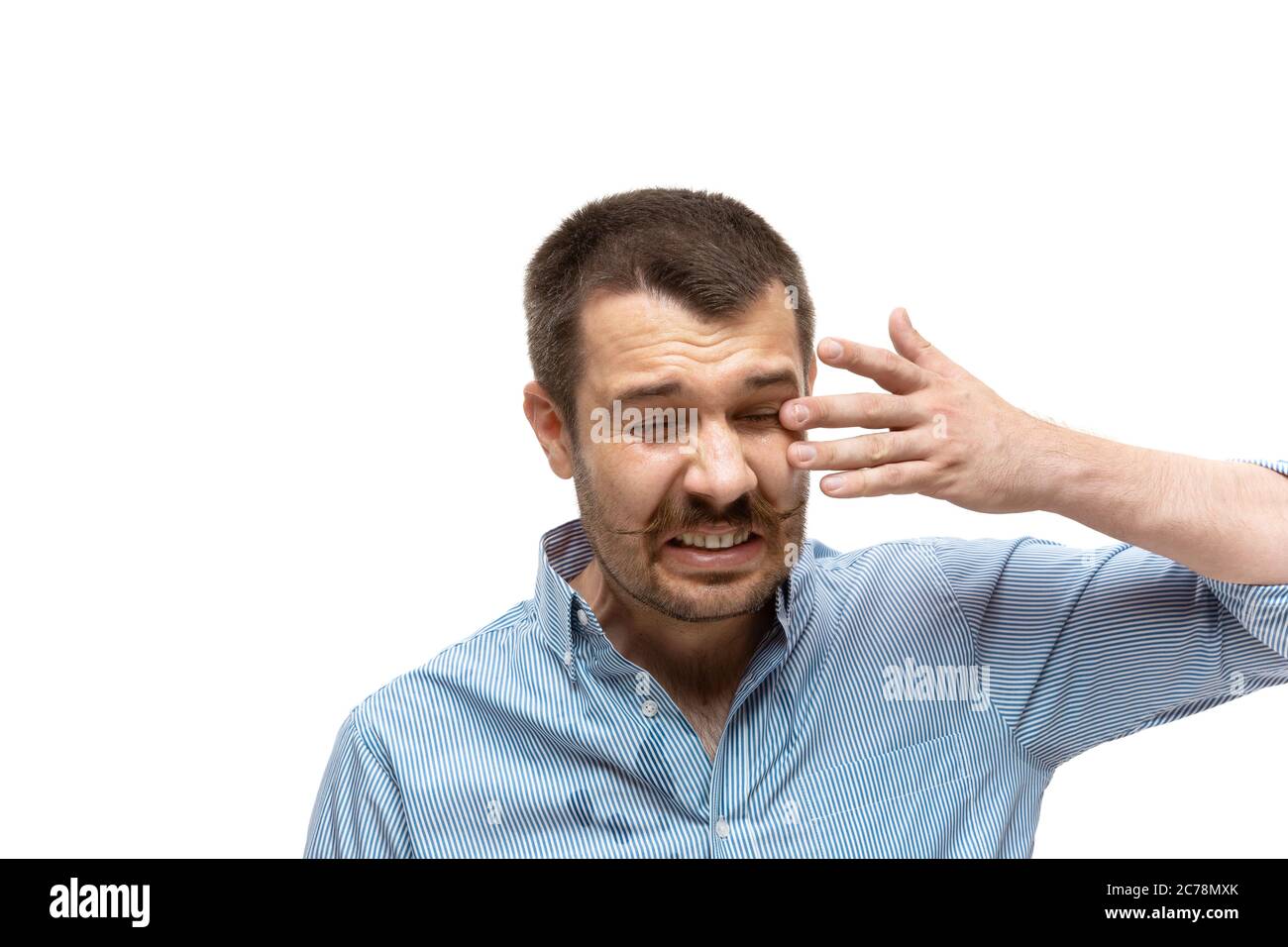 Crying. Young man with funny, unusual popular emotions and gestures ...