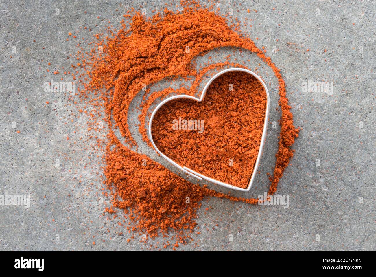 Chipotle Chili Powder in a Heart Shape Stock Photo - Alamy