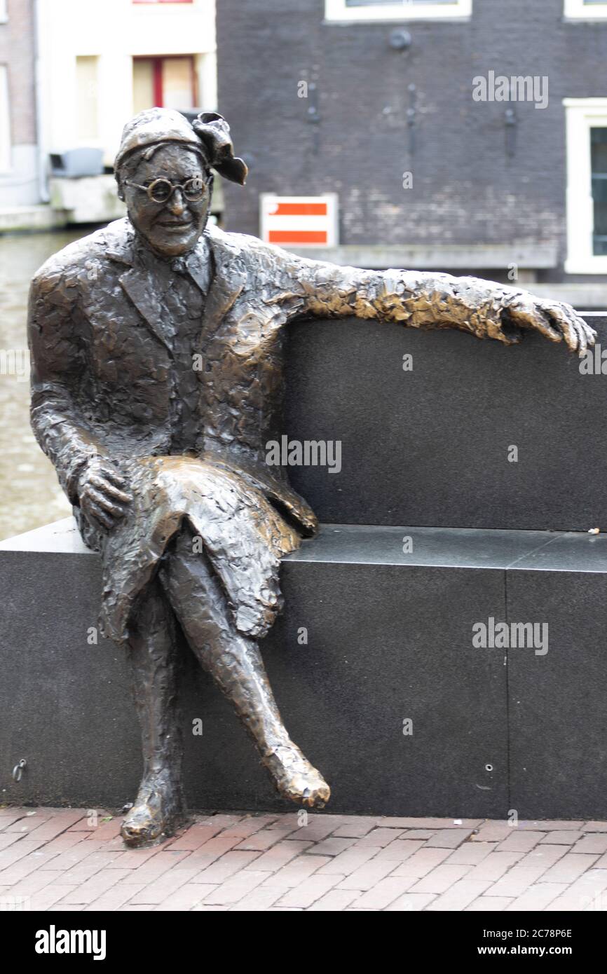 Cultural statue as a bench in Amsterdam,Netherlands Stock Photo - Alamy