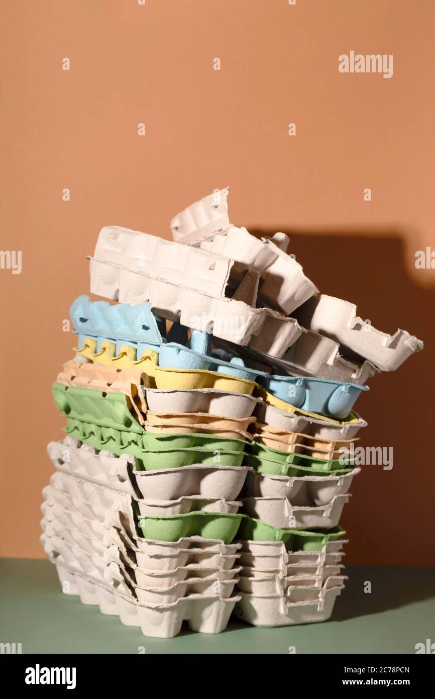 Colored trays from eggs. Garbage collection for recycling concept Stock ...