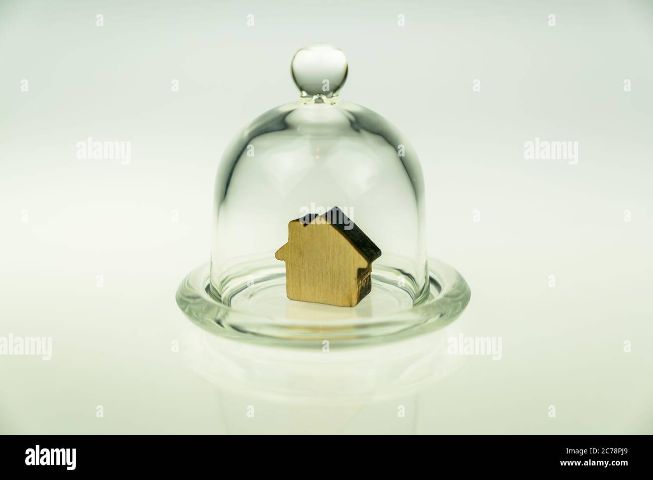 A wooden house under a glass cover Stock Photo - Alamy