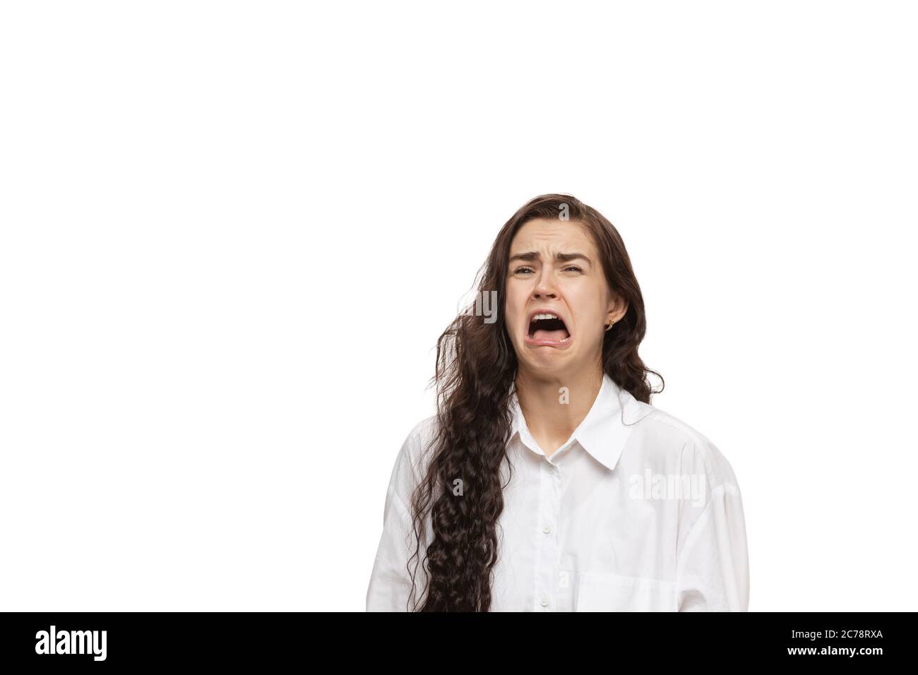 Crying. Young caucasian woman with funny, unusual popular emotions and ...
