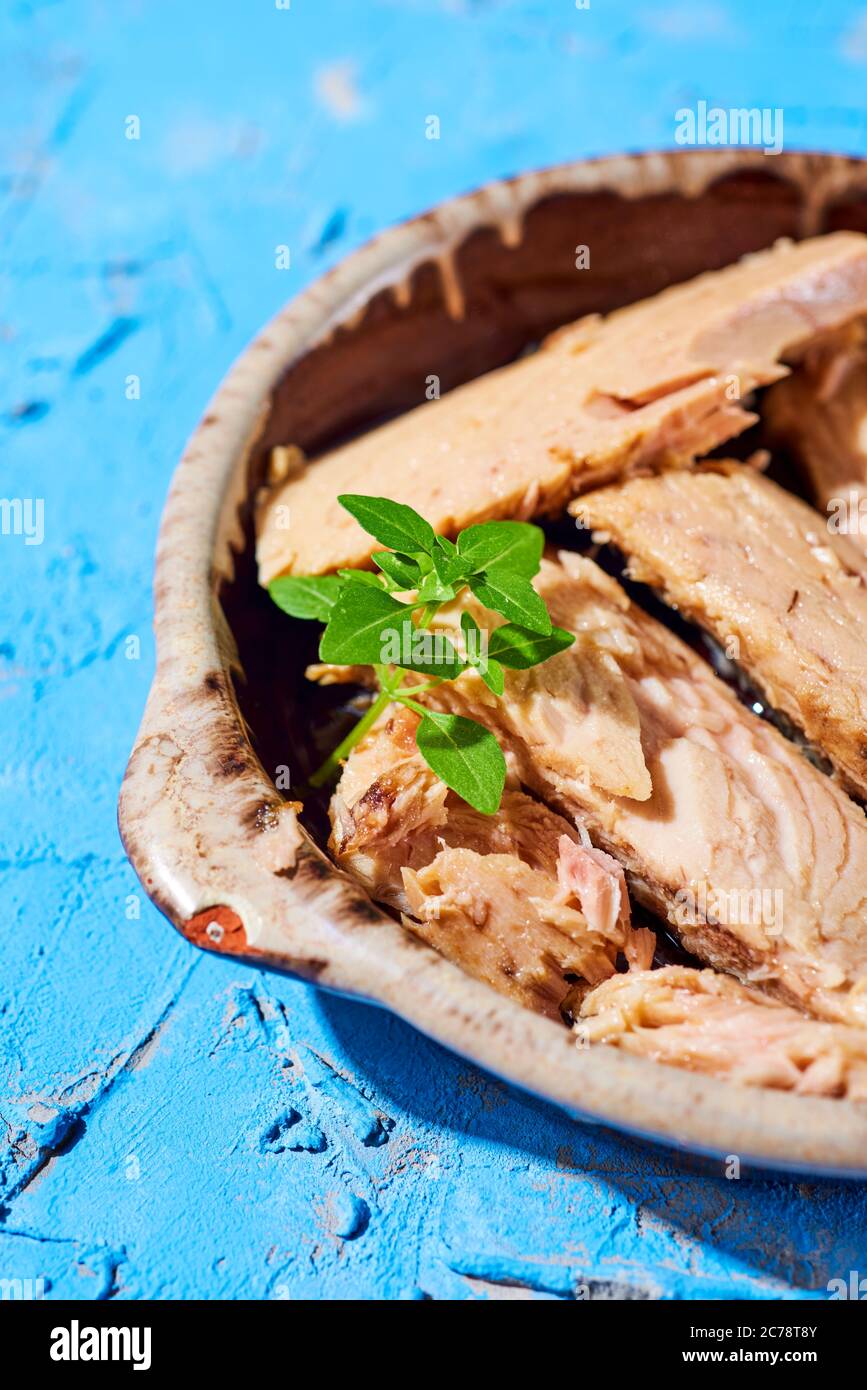 closeup of some pieces of spanish bonito en aceite, a mackerel-like ...