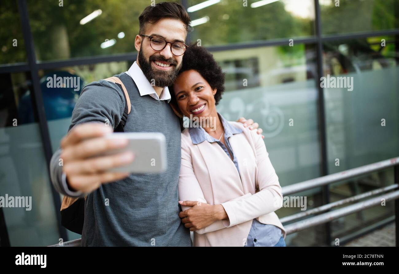 Happy loving couple. Happy young man and woman having fun together in ...