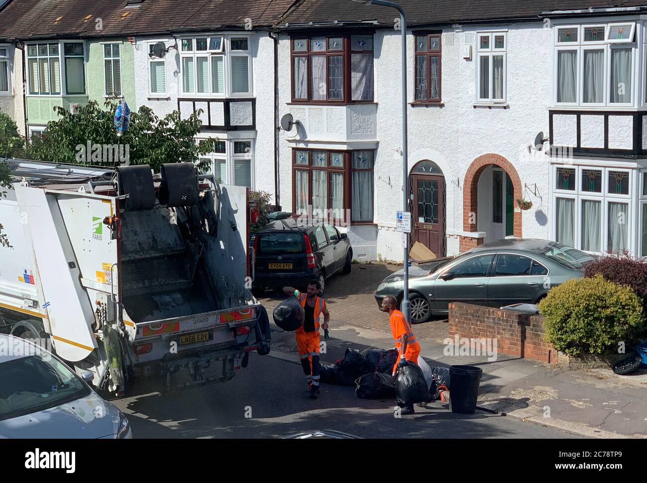 Work rubbish bin men hi-res stock photography and images - Alamy