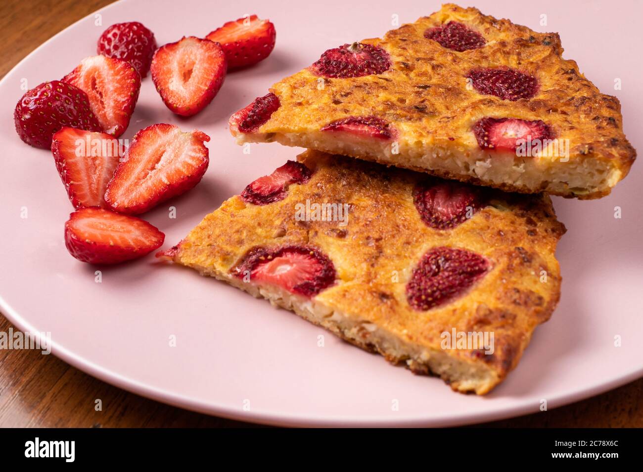 Sweet rice flour cake with strawberries. Homemade baking Stock Photo ...