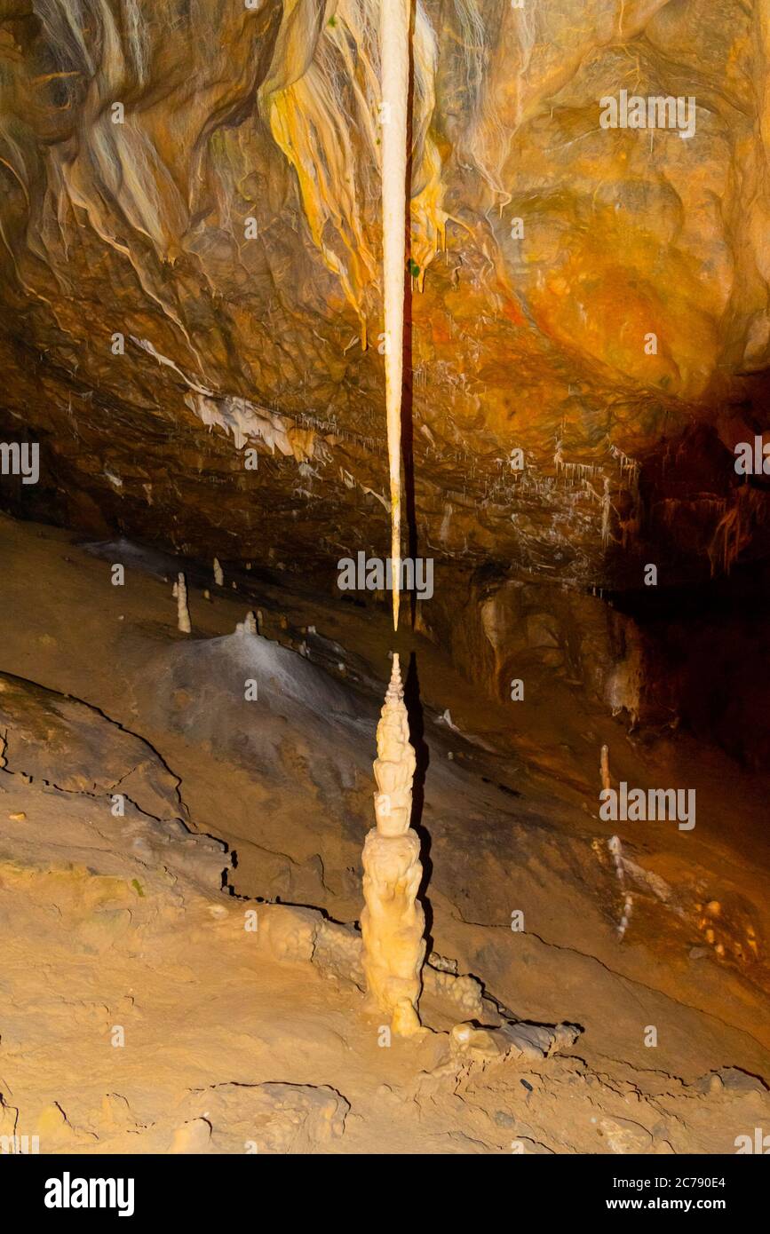 Long thin limestone stalactite and opposite stalagmite in Punkva Caves ...