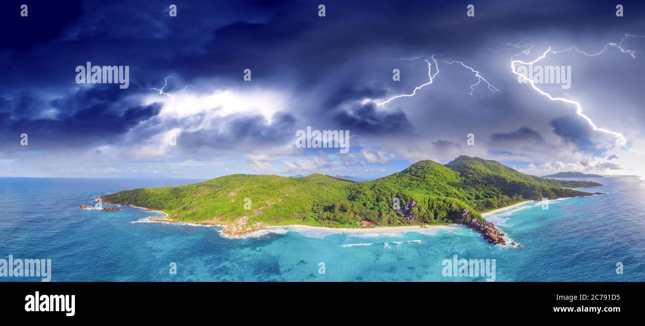 Aerial panoramic view of Tropical Island with storm approaching ...