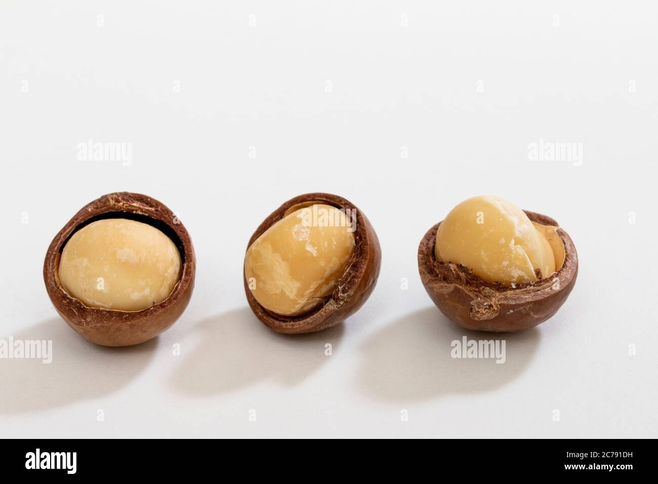 Macadamia nuts and shells Stock Photo - Alamy