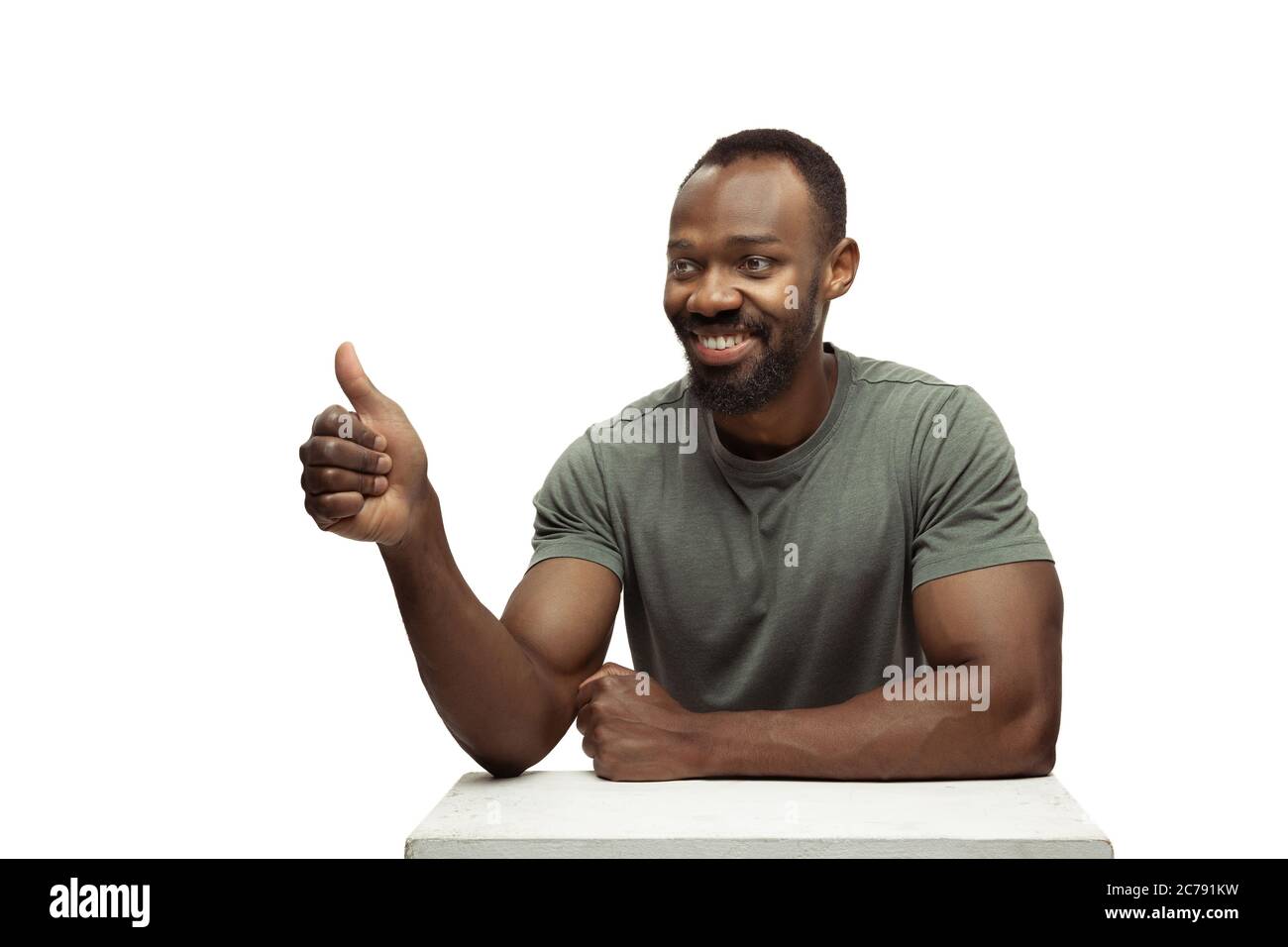 Like, thumb up. Young african-american man with funny, unusual popular ...