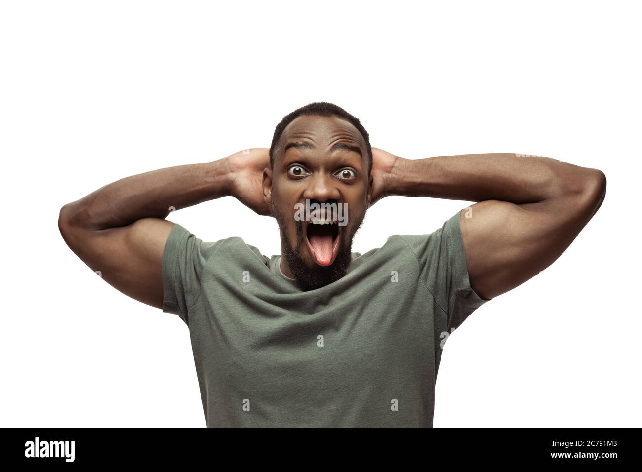 Going crazy. Young african-american man with funny, unusual popular ...