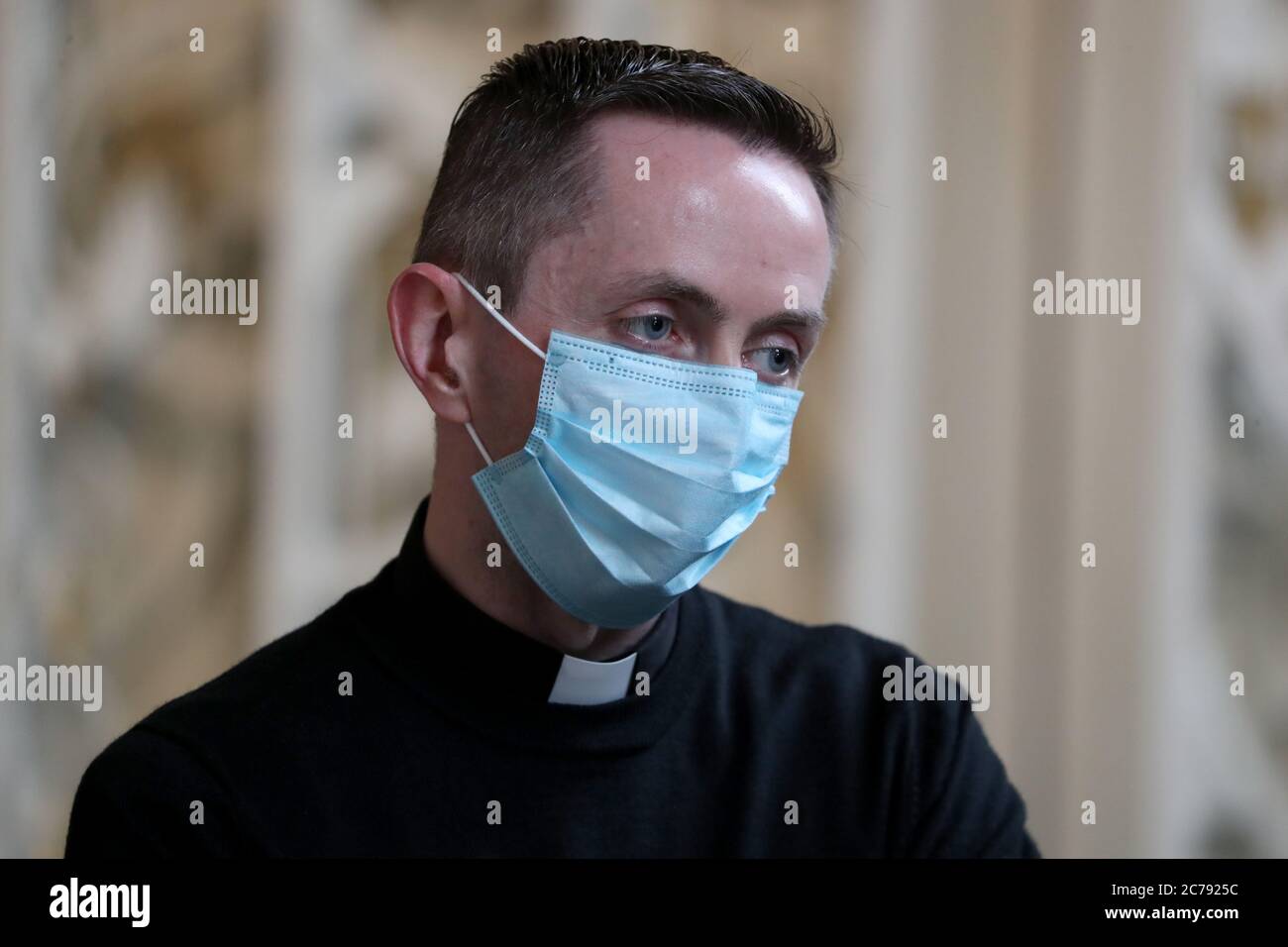 Canon Gerald Sharkey during the first mass at St Andrew's Cathedral in ...