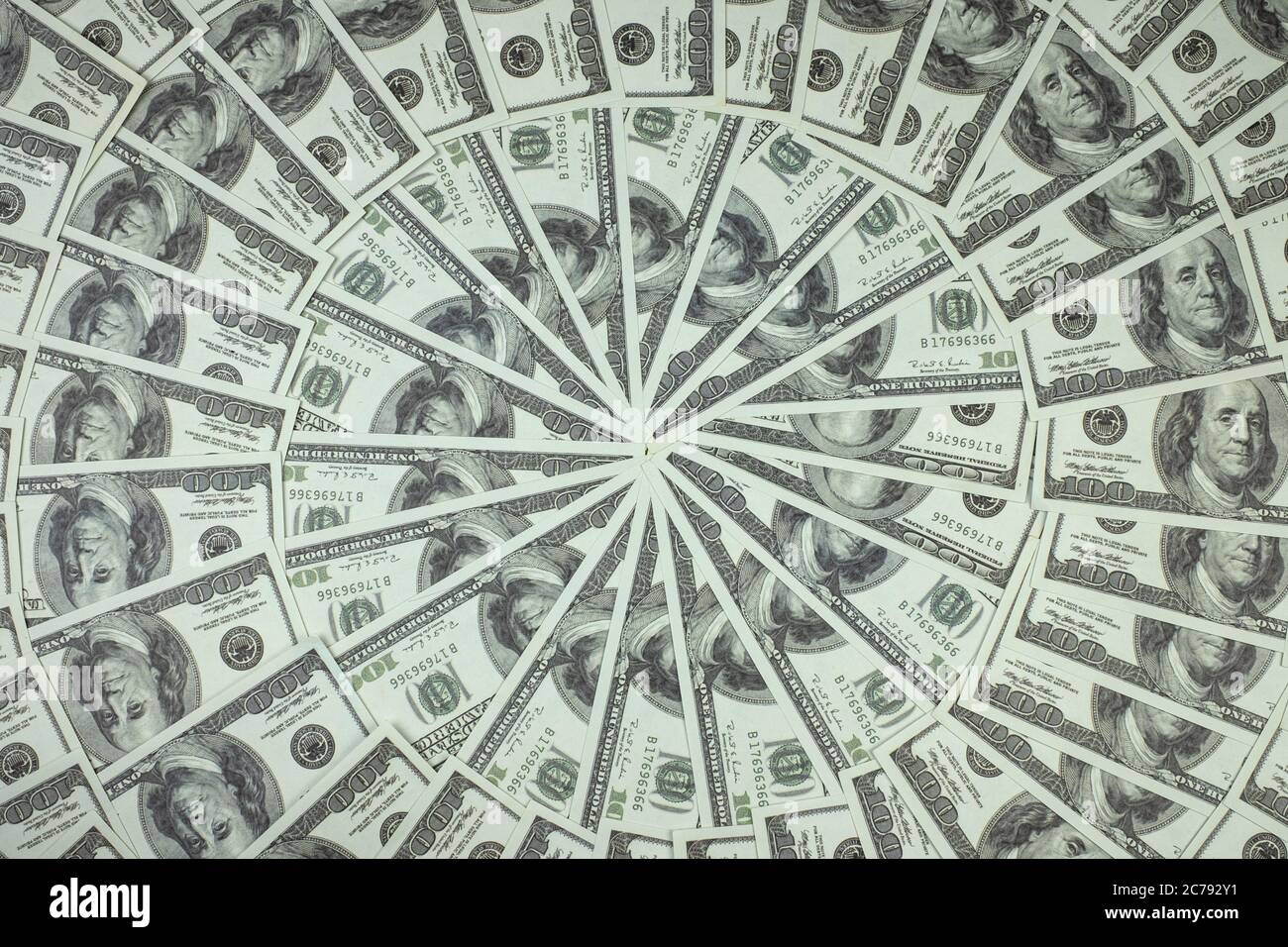 Group of money stack of 100 US dollars banknotes a lot of is arranged ...