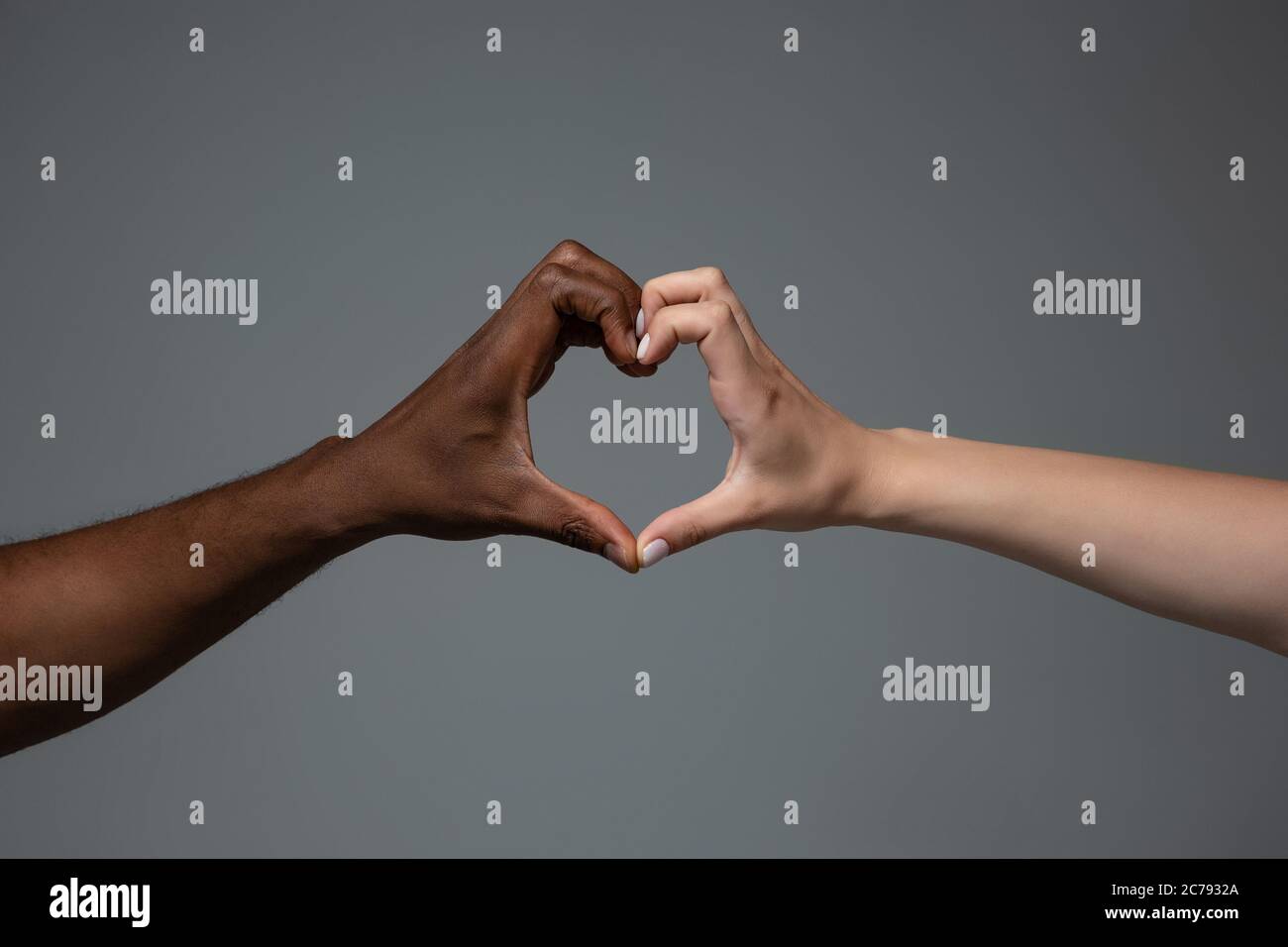 Love heart gesture. Racial tolerance. Respect social unity. African and ...