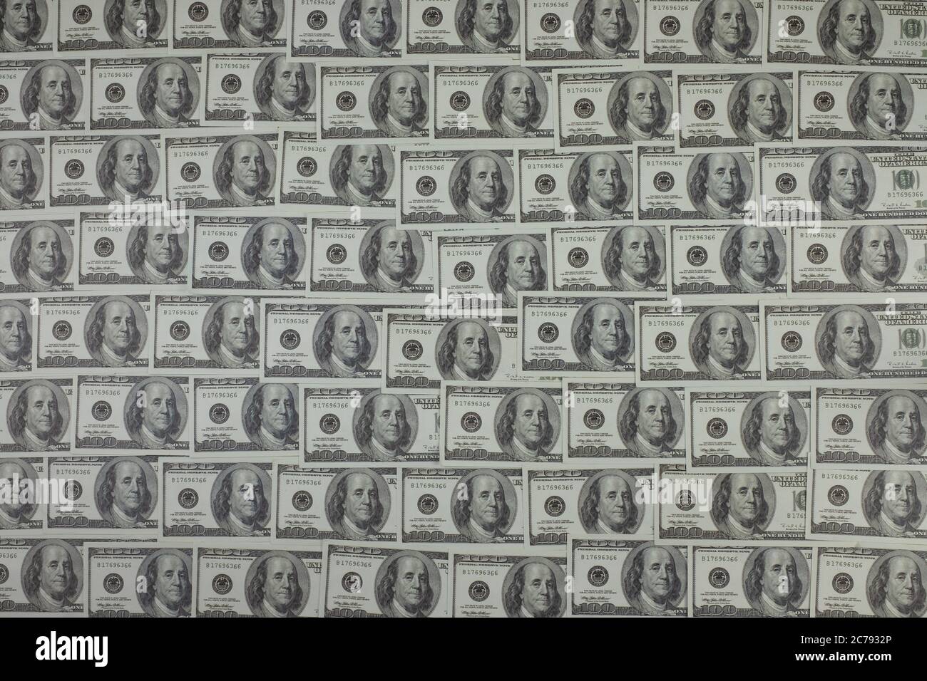 Group of money stack of 100 US dollars banknotes a lot of is arranged ...