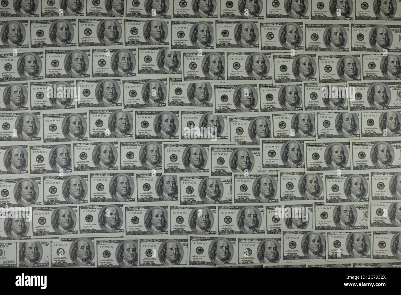 Group of money stack of 100 US dollars banknotes a lot of is arranged ...