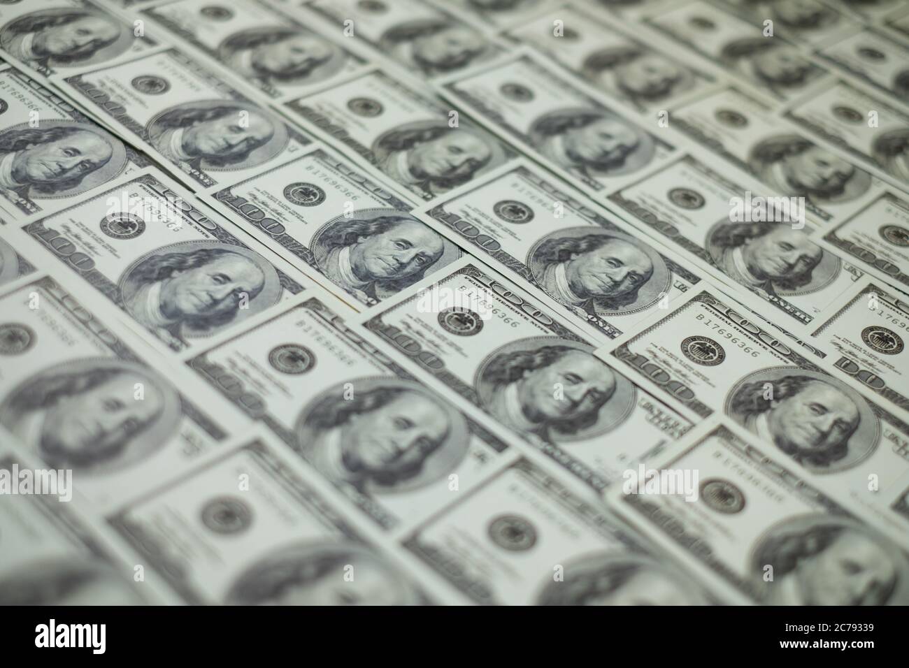 Group of money stack of 100 US dollars banknotes a lot of is arranged ...