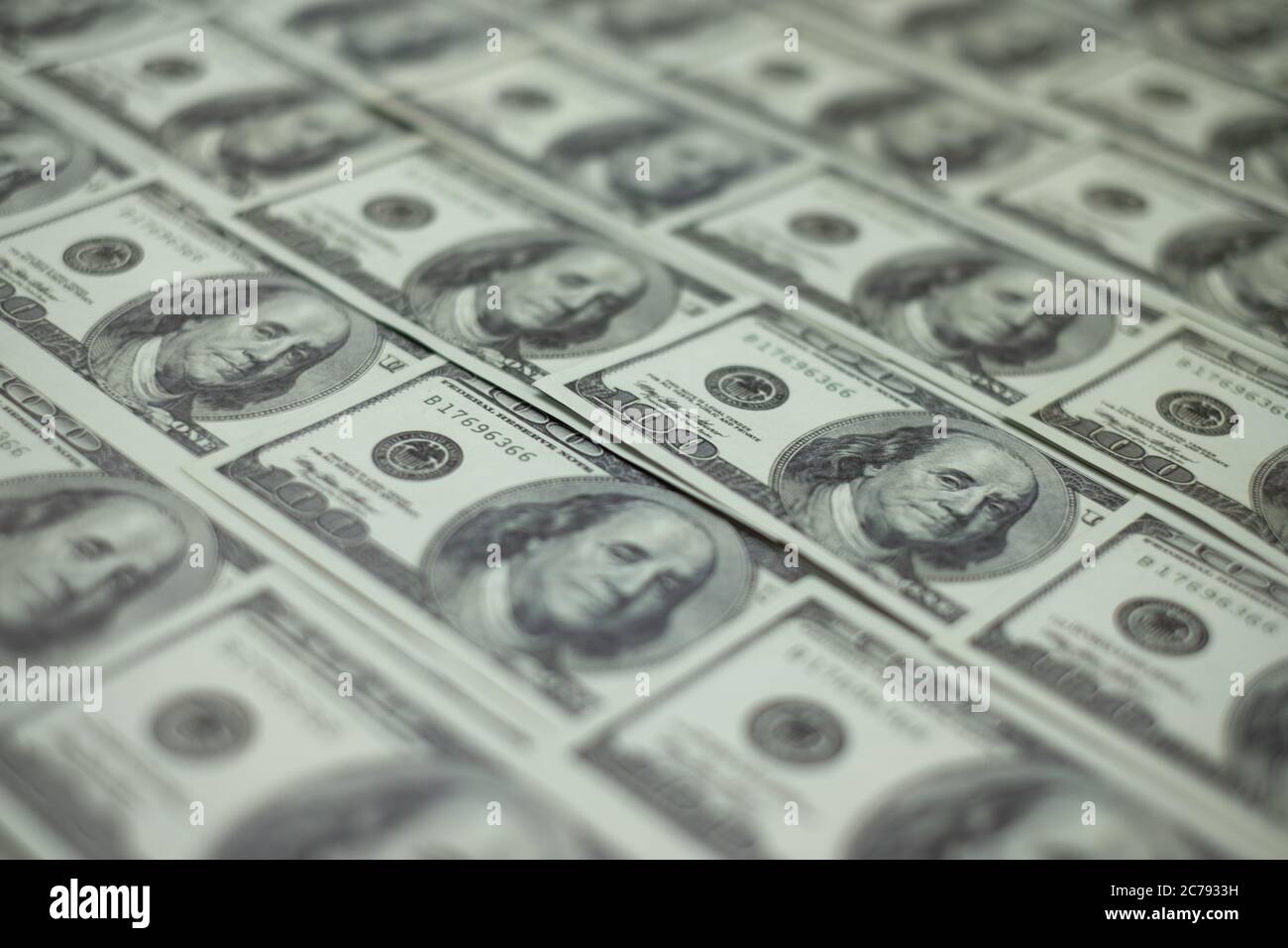 Group of money stack of 100 US dollars banknotes a lot of is arranged ...