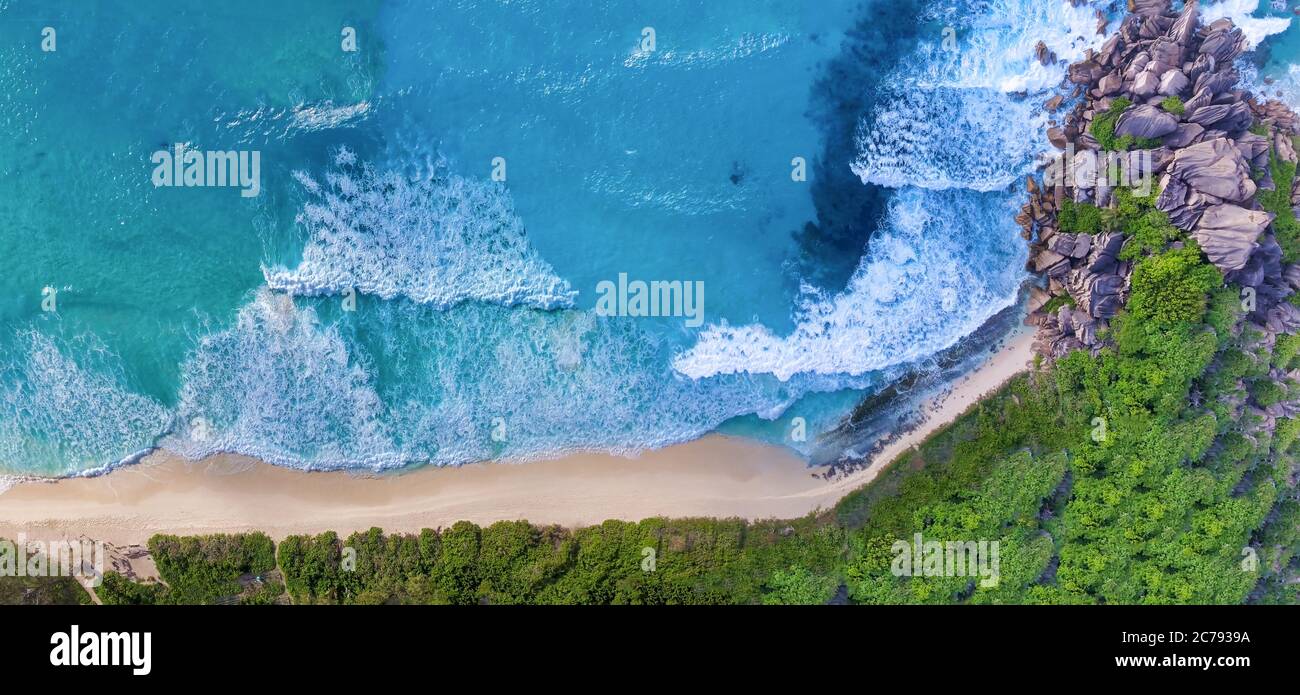 Amazing aerial view of Grand Anse in La Digue Island, Seychelles. Ocean ...