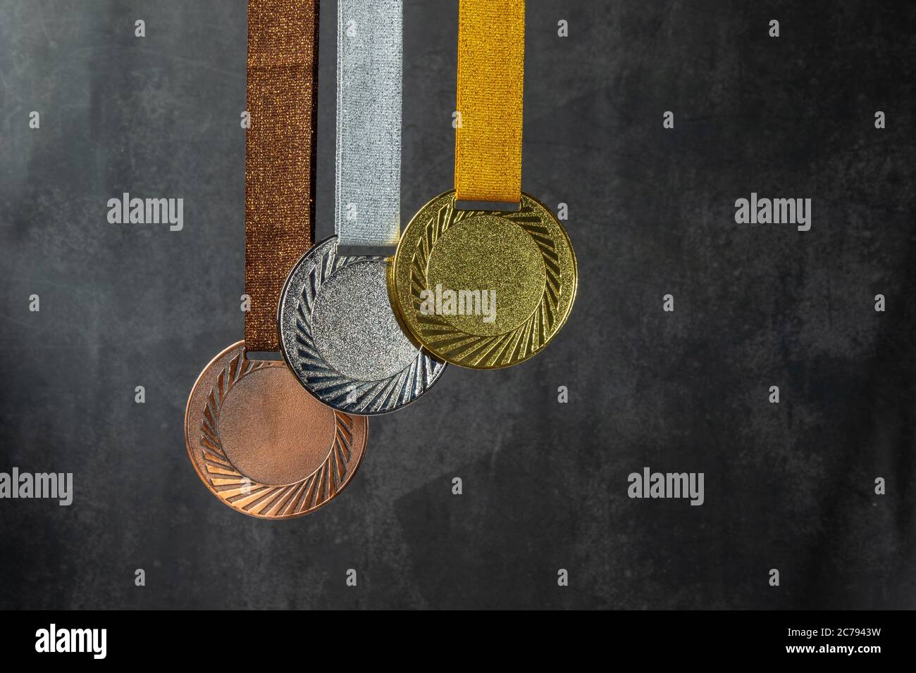Gold medal, silver medal and bronze medal concept for winning or ...